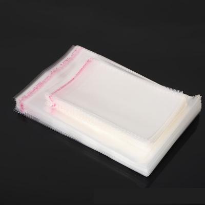 China Width 20cm Wholesale Customized Self Seal Adhesive Bopp Pp Opp Poly Plastic Cello Packaging Bags for Candy Garment Clothing for sale