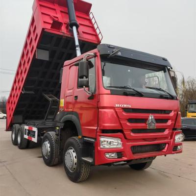 China Sinotruk Howo 371 8x4 handgestuurde dumptruck 10-12 wiel 30 ton zanddiesel rechtse zware vrachtwagen segment gebruikt voor mijnbouw Te koop