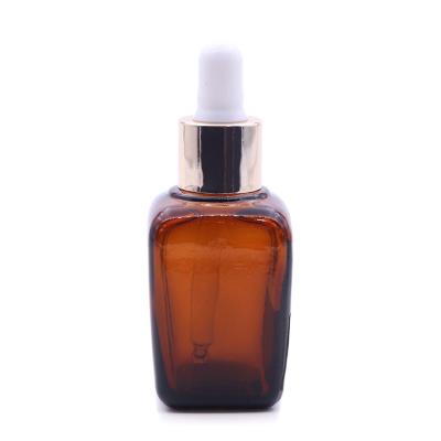 Cina Vetro quadrato Amber Essential Oil Bottles 15ml 25ml 35ml 50ml 100ml con il contagoccia in vendita