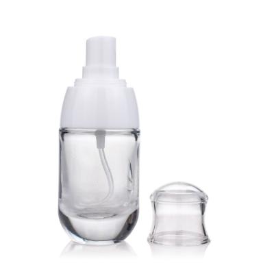 China Fundación líquida de cristal vacía clara de la botella 30ml de la bomba con la bomba en venta