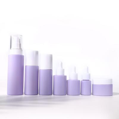 China Glass Cosmetics Pump Bottle Custom Packaging Round 40ml 50ml 100ml Skin Care for sale