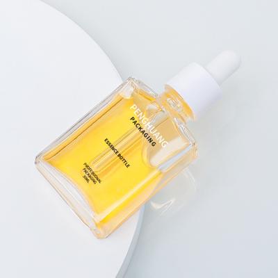 Cina bottiglie di vetro d'imballaggio del siero di forma del quadrato della bottiglia di vetro 30ml con il contagoccia in vendita