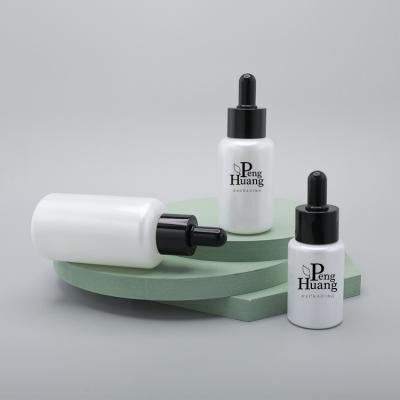 China Glass Boston Round Bottle 30ml 50ml 100ml Silk Screen Printing With Dropper for sale