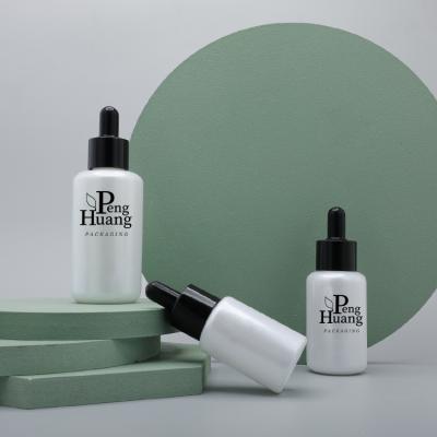 China Glass Boston Round Bottle 30ml 50ml 100ml Silk Screen Printing With Dropper for sale