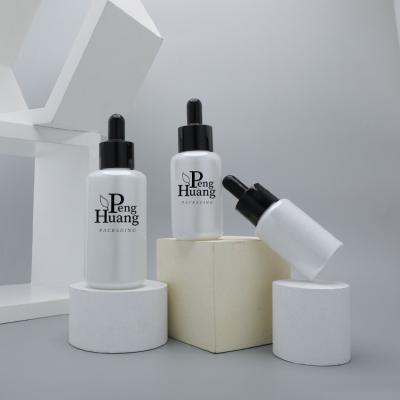 China Glass Boston Round Bottle 30ml 50ml 100ml Silk Screen Printing With Dropper for sale