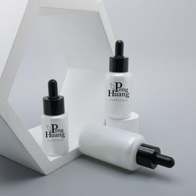 China Glass Boston Round Bottle 30ml 50ml 100ml Silk Screen Printing With Dropper for sale
