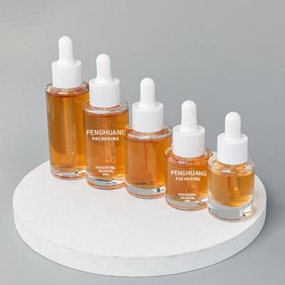 China 15ml 20ml 30ml 40ml 50ml Serum Dropper Bottle Oil Packaging Glass Round Shape for sale