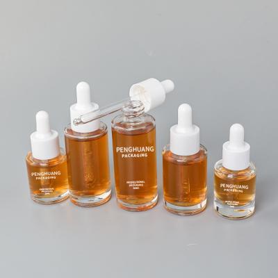 China 15ml 20ml 30ml 40ml 50ml Serum Dropper Bottle Oil Packaging Glass Round Shape for sale