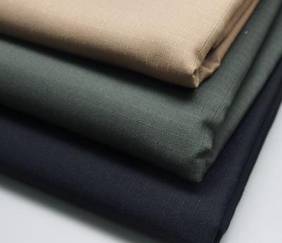 중국 직선 고 찢기 강성 폴리cotton SA 위장 리프 스톱 직물 230gsm 너비 57/58 판매용