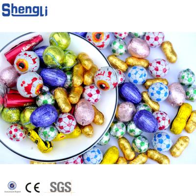 中国 精簡されたパッケージングのための完全な自動チョコレートエッグジョイサプライズ包装機 販売のため