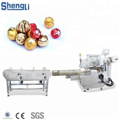 China Máquina de embalagem multifunção para linha de processamento de bola de bola de wafer de chocolate personalizada à venda