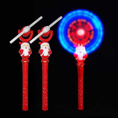 Cina La musica di Santa accende l'incandescenza del filatore 12 LED del mulino a vento nelle girandole scure in vendita