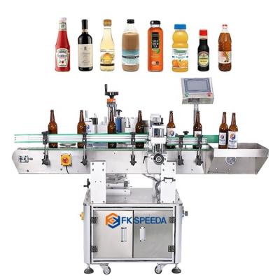 China Máquina de rotulagem automática a motor elétrico para garrafas redondas de vinho e cerveja de plástico à venda