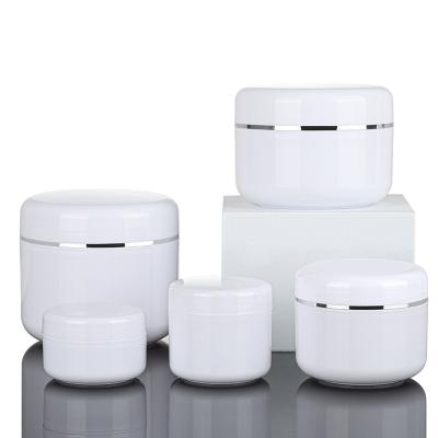 Cina Linea d'argento d'imballaggio crema intorno a forma, 2 contenitori cosmetici del barattolo dell'ANIMALE DOMESTICO di Oz in vendita