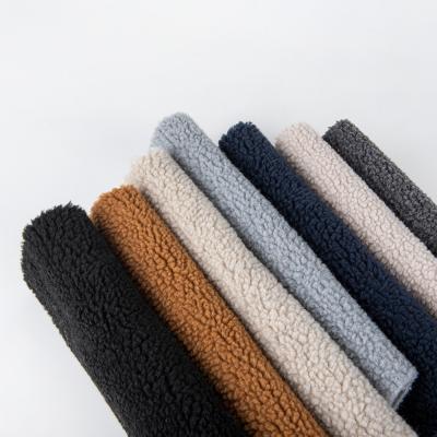 Китай Настраиваемая пряжа Count Sherpa Lamb Borg Wool Plain Plush Ткань для одежды продается