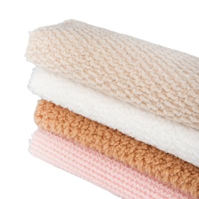 China 100% polyester zacht gebreide pluisvoet Shu fluweel Mirco Sherpa stof lichtgewicht Te koop