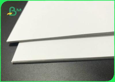 China 250gsm - 400gsm 61 * los 61cm cubrió al tablero de papel a dos caras para las cajas de la crema dental en venta