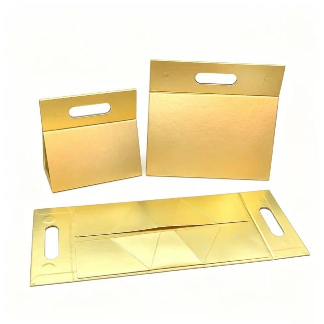 Metallic gold triangular rigid gift box demonstrated flat-packed and fully assembled
