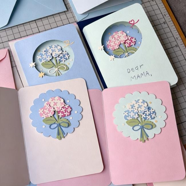 Assorted handmade greeting cards featuring circular window cut-outs and 3D layered paper flower bouquets