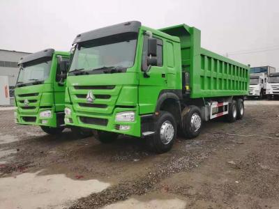 China Tweedehands Sinotruk HOWO Truck Gebruikte vrachtwagens met recht rijden 20cbm Bucket Dimension Te koop