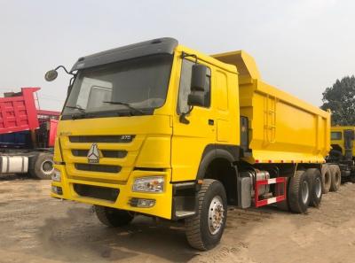 China Nigeria Ghana HOWO 375HP Gebruikte Sinotruk dumptruck met Hw76 cabine en 351-450 pk Te koop