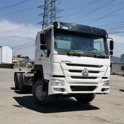 China Excelente estado Sinotruk HOWO de segunda mão cabeça de semi-reboque com 2 marchas para trás à venda