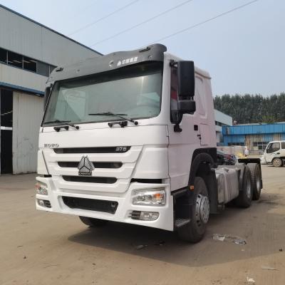 中国 高エンジン容量 HOWO 3軸 6X4 トラクター トラックヘッド アフリカの購入者向け 販売のため