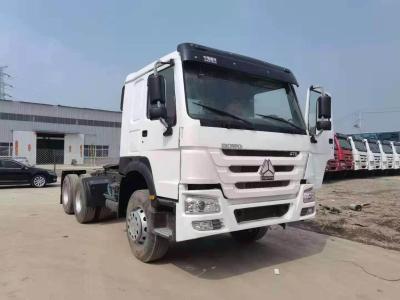 Cina Zz4257s3241W 6X4 10 ruote HOWO Trattore Capo del camion con cambio Hw19710 resistente in vendita