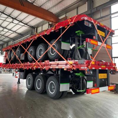China 80 ton laadvermogen 3 assen 4 assen vracht flatbed aanhangwagen voor zware leveringen Te koop