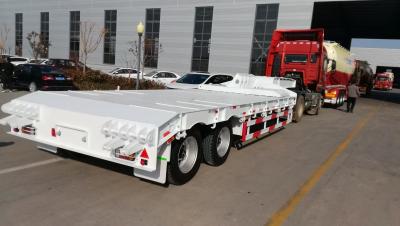 China Suspensão tipo braço cruzado 3 eixos 4 eixos carga pesada semi-reboque de cama baixa com rampa à venda