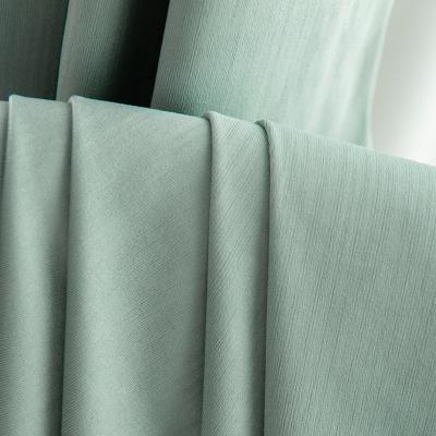 Cina Wholesale 100% full shading new bamboo fiber formaldehyde-free modern simple solid color curtain in vendita