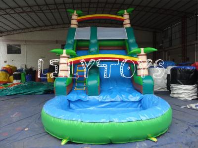 中国 Lilytoys の緑公園膨脹可能な水スライドはヤシの木が付いているポリ塩化ビニールをカスタマイズします 販売のため
