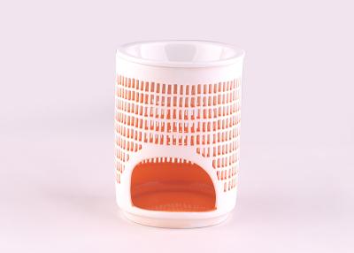 中国 ふた、陶磁器の Tealight の蝋燭ホールダーが付いている着色された陶磁器の香りバーナー 販売のため