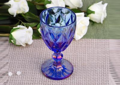 中国 浮彫りになる骨董品によって着色されるガラス蝋燭ホールダーの虹色の青いStemware 販売のため