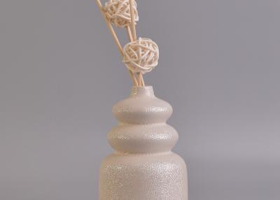China garrafas cerâmicas dadas forma cabaceiro vitrificadas do óleo da fragrância da pérola 239ml pontos brancos à venda