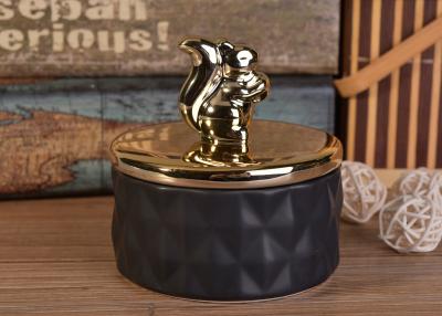 China Ceramische de kaarskruiken van de steen zwarte diamant met gouden dierlijke deksels voor decoratie Te koop
