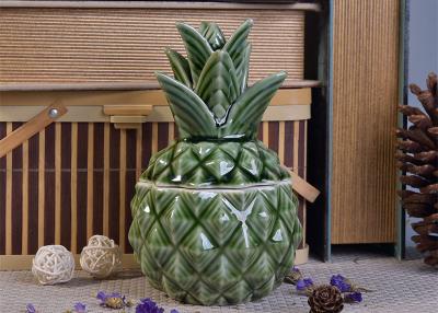 China Frasco cerâmico de vitrificação verde da vela do abacaxi com a tampa para a decoração do casamento à venda