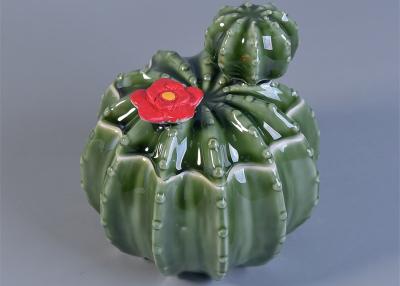 中国 緑のサボテンの家の芳香の装飾のためのふたが付いている定形陶磁器の蝋燭ホールダー 販売のため