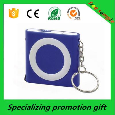 China O diodo emissor de luz ilumina o PVC do presente/fita métrica retrátil de aço de 1m com Keychain à venda