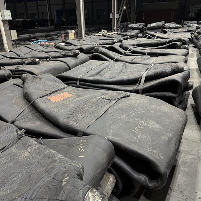 Multiple marine airbags arranged for vessel launching at shipyard