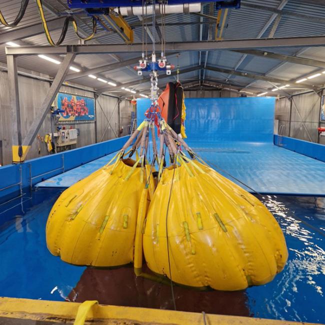 Load testing water bag being filled with water during crane proof load test