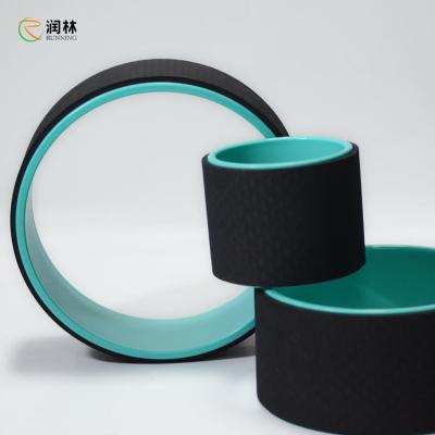 Cina La ruota 32*13cm del rullo della parte posteriore di yoga del TPE dei pp migliora la flessibilità e la stabilità in vendita