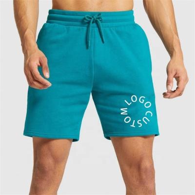 China Van de Gymnastieksporten van de Bermudas de Trainingborrels die Zweetfitness Jogger Gedrukt Embleem in werking stellen Te koop