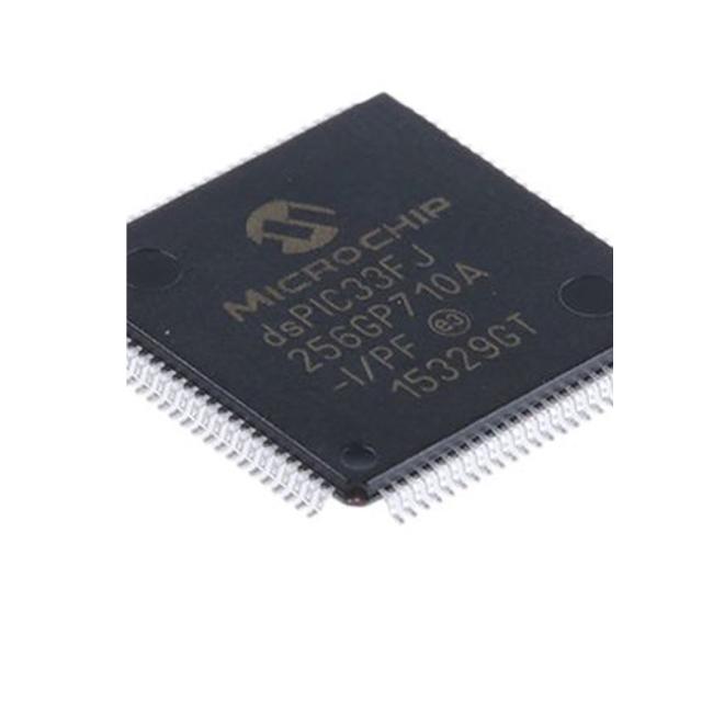 Close-up view of DSPIC33FJ256GP710A-I/PF chip pins