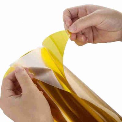 Cina Nastro adesivo in poliimmide ambra Nastro adesivo in pellicola Kapton da 50 micron con rivestimento di rilascio in vendita