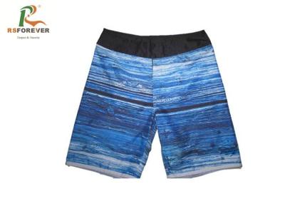 Cina Gli uomini blu atletici mettono i tronchi in cortocircuito di nuotata, rapidamente shorts asciutti di nuotata con le tasche in vendita