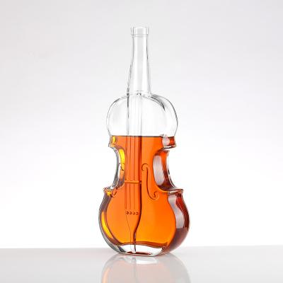 Cina Bottiglia in vetro di brandy tequila gin a forma di violino con tappo a vite di sughero e capacità di 30 ml in vendita