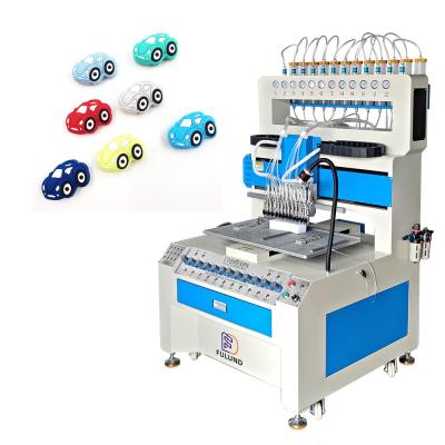 Cina FuLund factory 12 18 24 colors fully Automatic rubber Pvc Label Logo Patch Case Making Silicone Dispensing machine in vendita