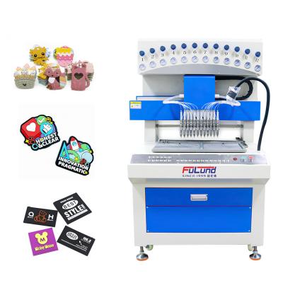 Cina Fully Automatic pvc silicone drip mold machine for make shoe sole slipper phone case key chain glue dispenser in vendita