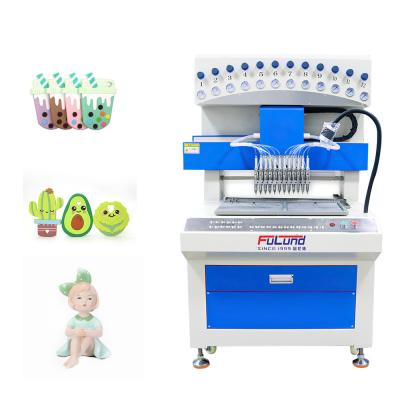 Cina Fulund Fully Automatic pvc silicone drip mold machine for make key chain toys glue dispenser machinely in vendita